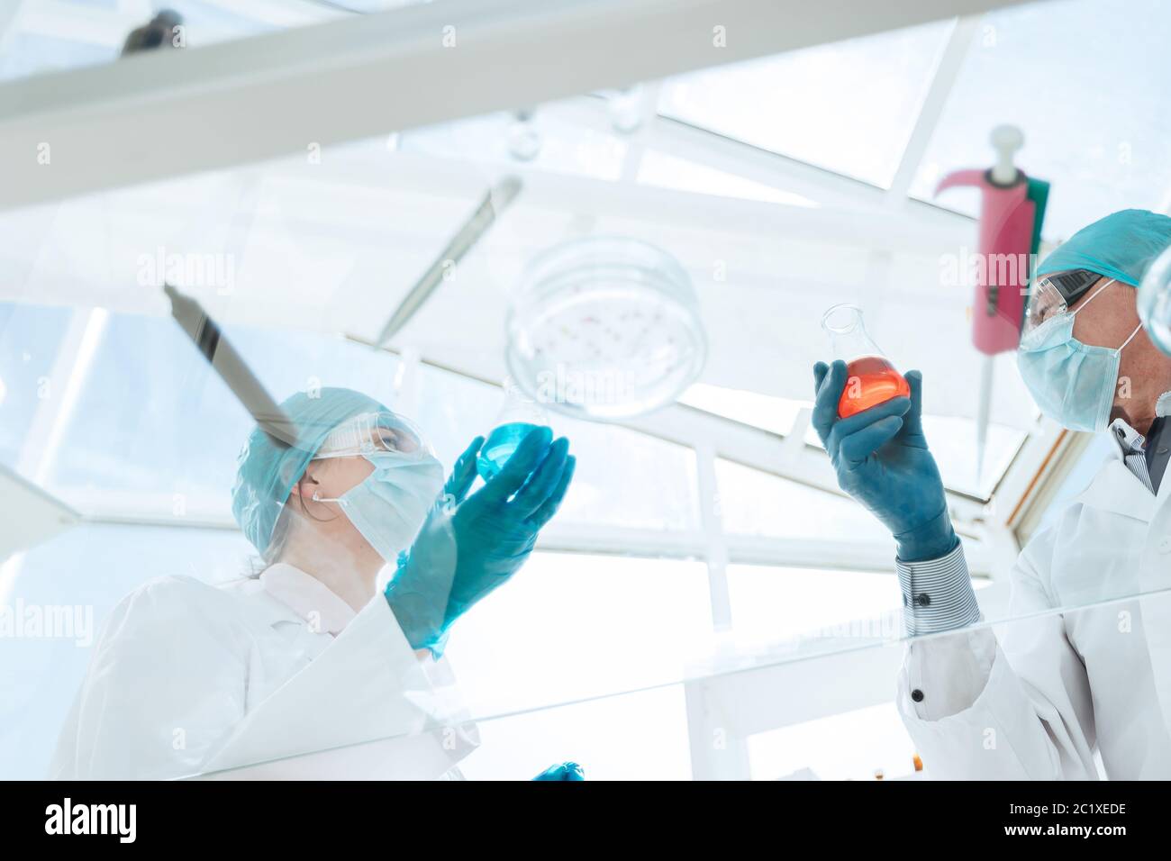 modern scientists and doctors work in a medical laboratory Stock Photo ...