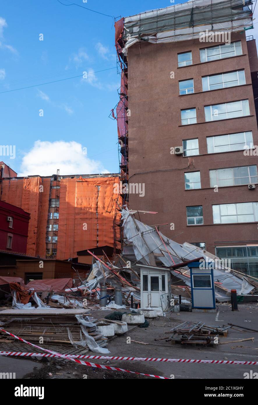 Scaffolding collapsed from a strong wind near a reconstructed multi ...