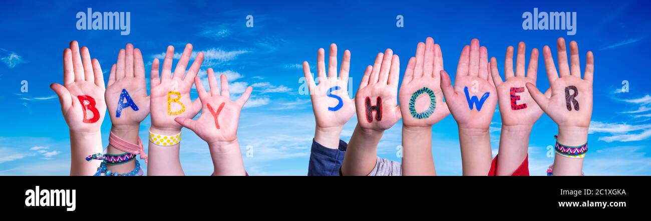 Children Hands Building Word Baby Shower, Blue Sky Stock Photo - Alamy