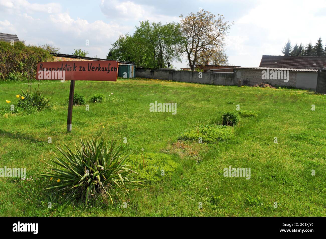 Building plot for sale Stock Photo - Alamy