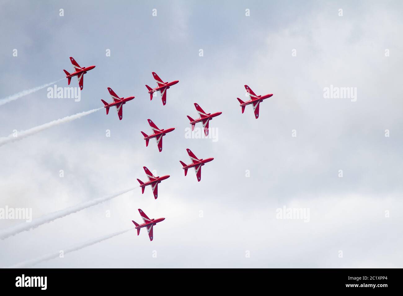 An RAF Red Arrow Display in England Stock Photo - Alamy