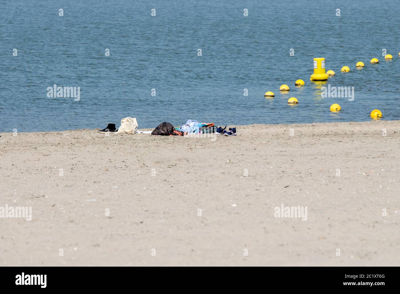 Clothes On A Beach At IJburg Amsterdam The Netherlands 17 May 2020 ...