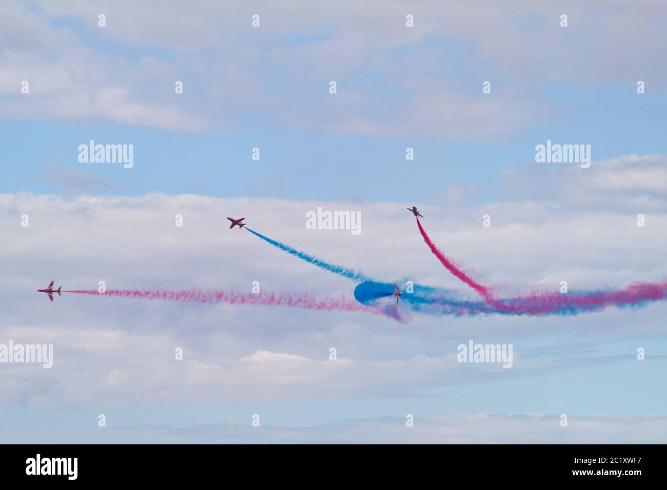 An RAF Red Arrow Display in England Stock Photo - Alamy