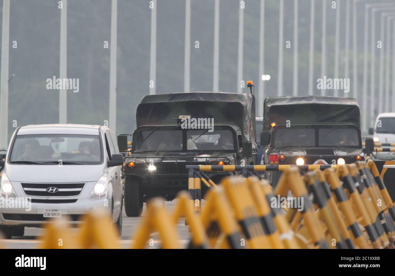 16th June, 2020. U.S. military vehicles cross over Unification Bridge U ...
