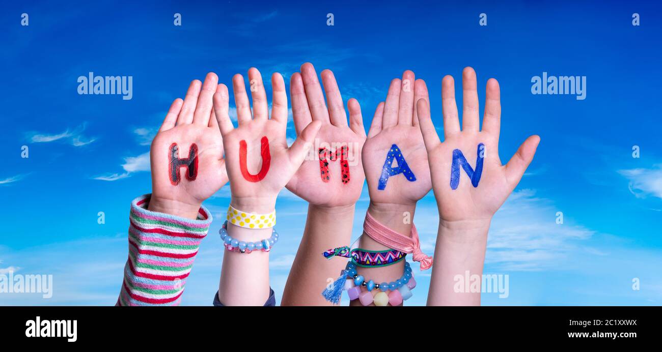 Children Hands Building Word Human, Blue Sky Stock Photo - Alamy