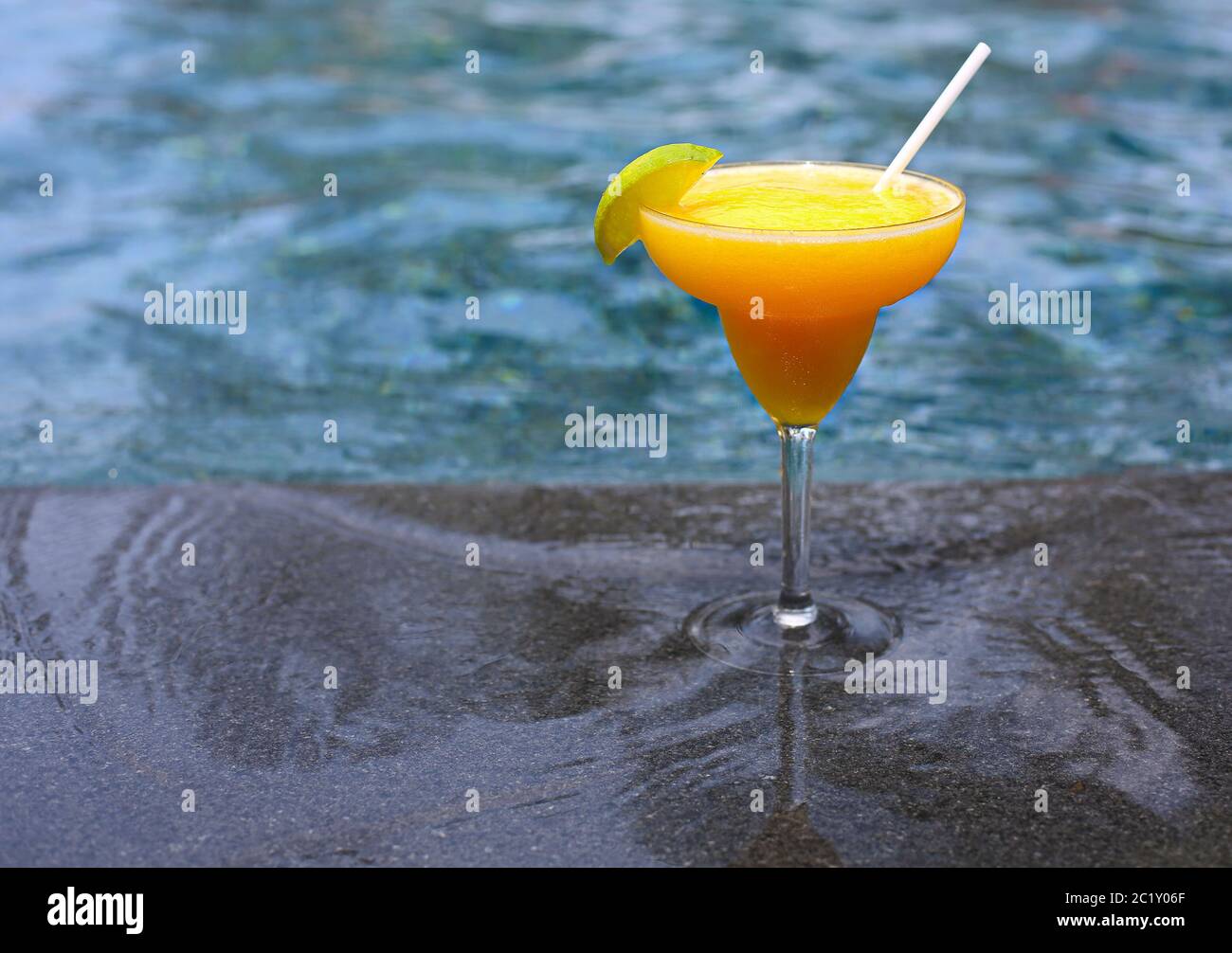 Mango daiquiri on the pool background Stock Photo - Alamy
