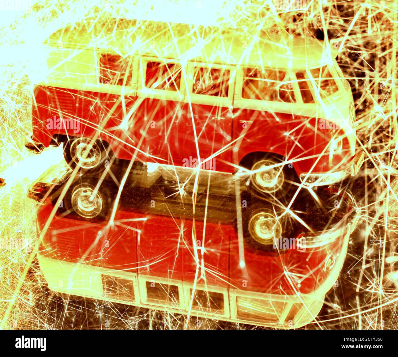 Sparkles around a miniature car Stock Photo - Alamy