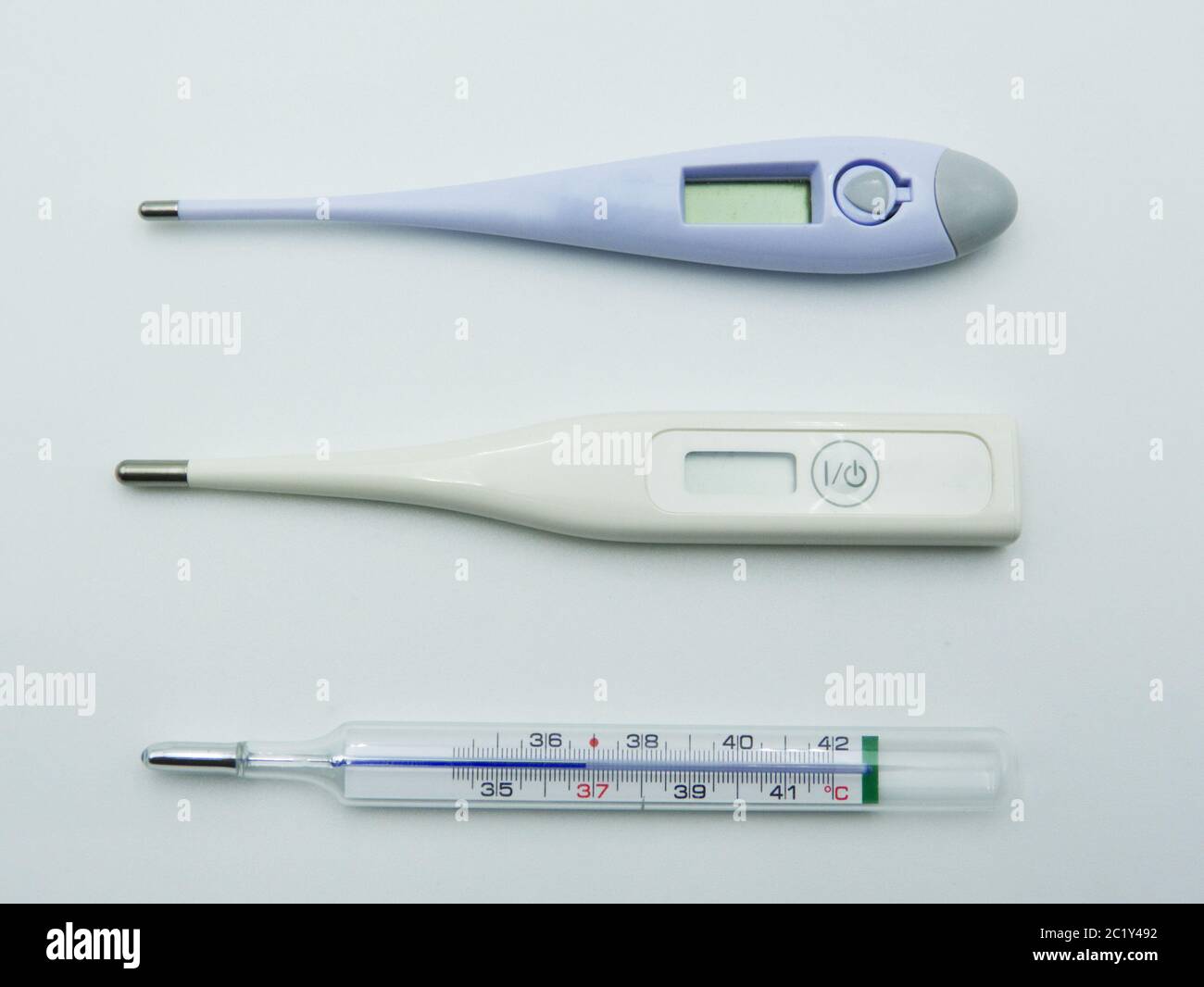 Digital and analogic medical Thermometers isolated on white background ...