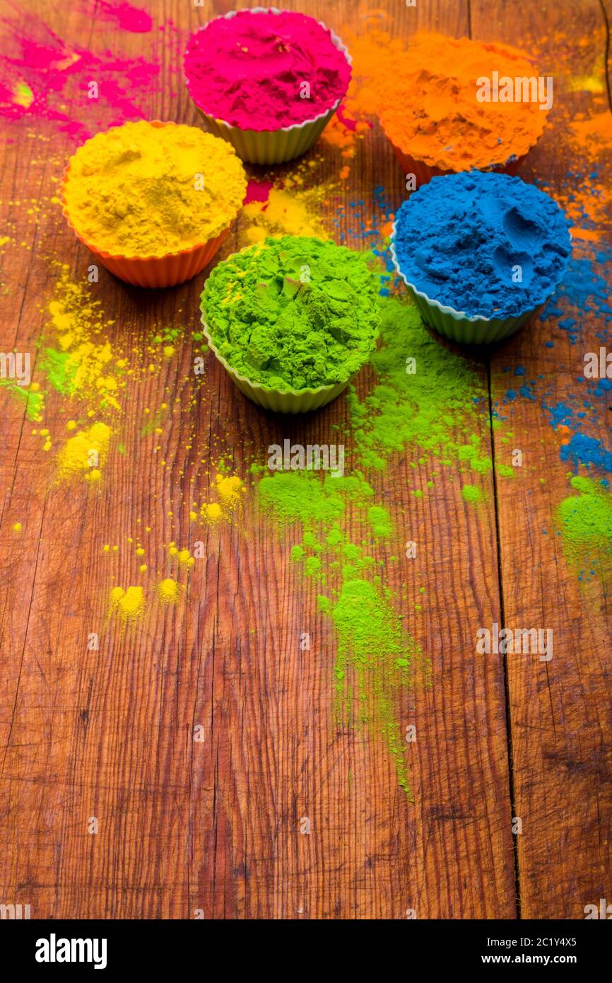 Holi color powder. Organic Gulal colours in bowl for Holi festival ...