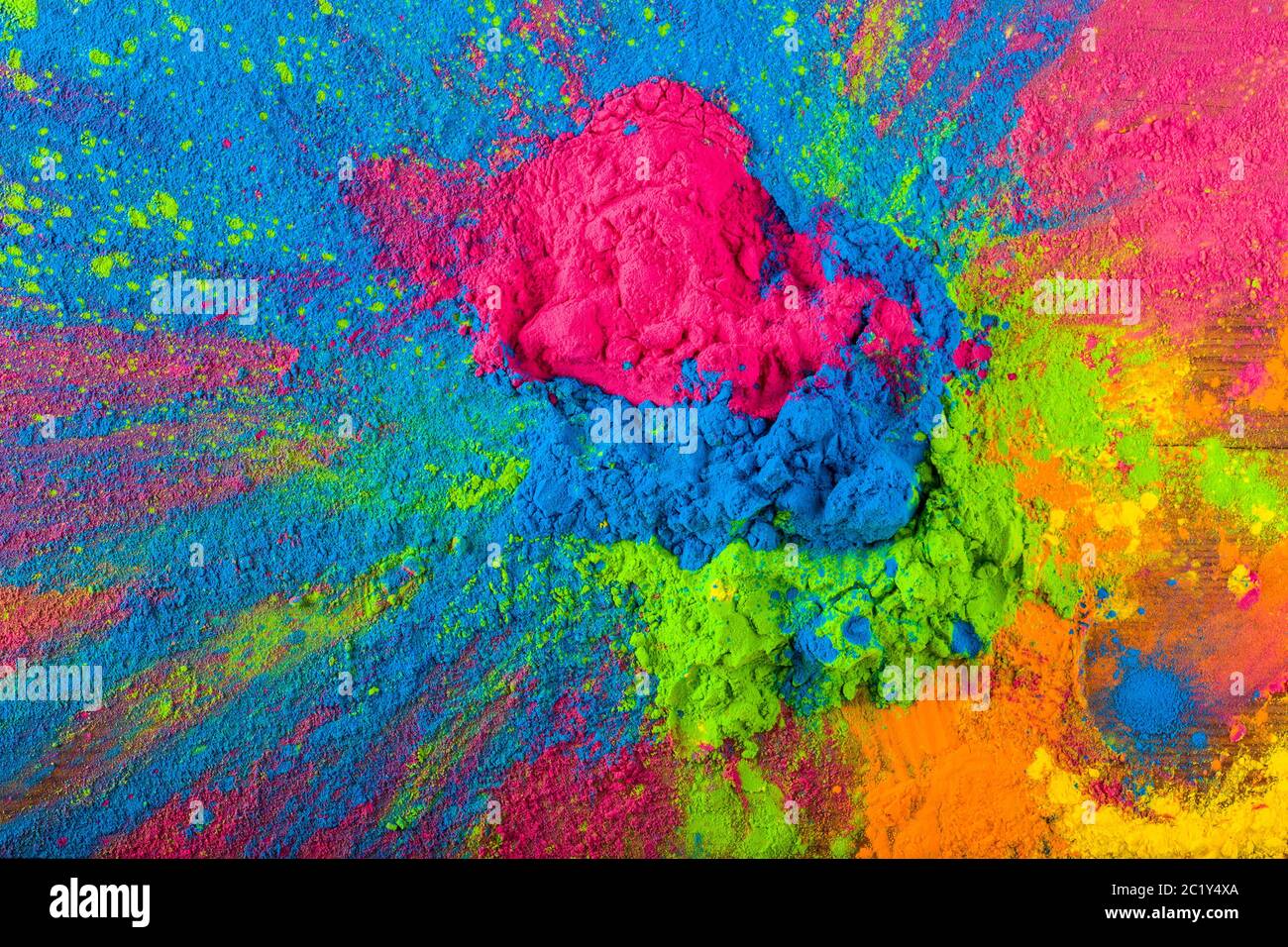 Abstract colorful Happy Holi background. Color vibrant powder on wood ...