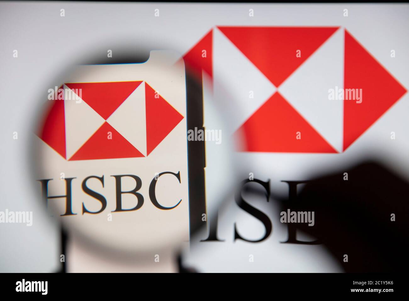 LONDON, UK - June 2020: HSBC bank logo on a smart under magnifying ...