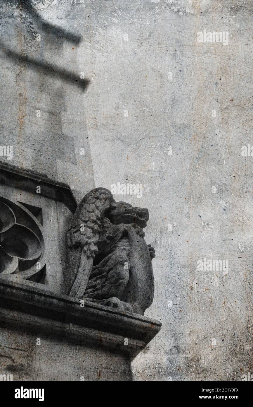 A gargoyle, sitting on building. With a grunge, vintage edit Stock ...