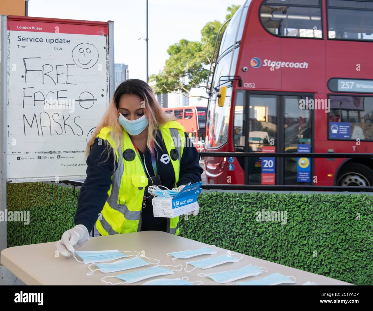 TfL staff giving out face masks at Stratford bus station after the ...