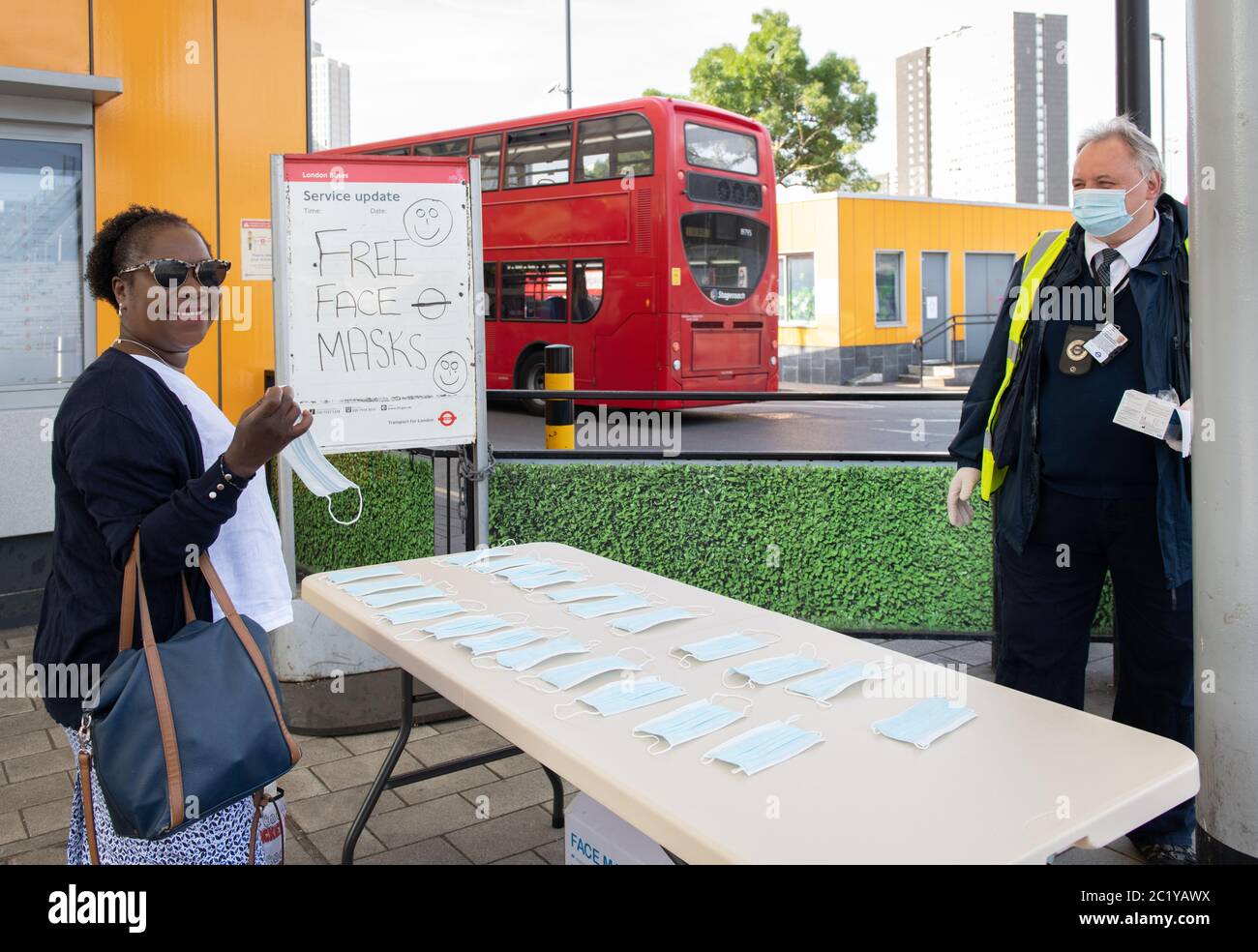 TfL staff giving out face masks at Stratford bus station after the ...
