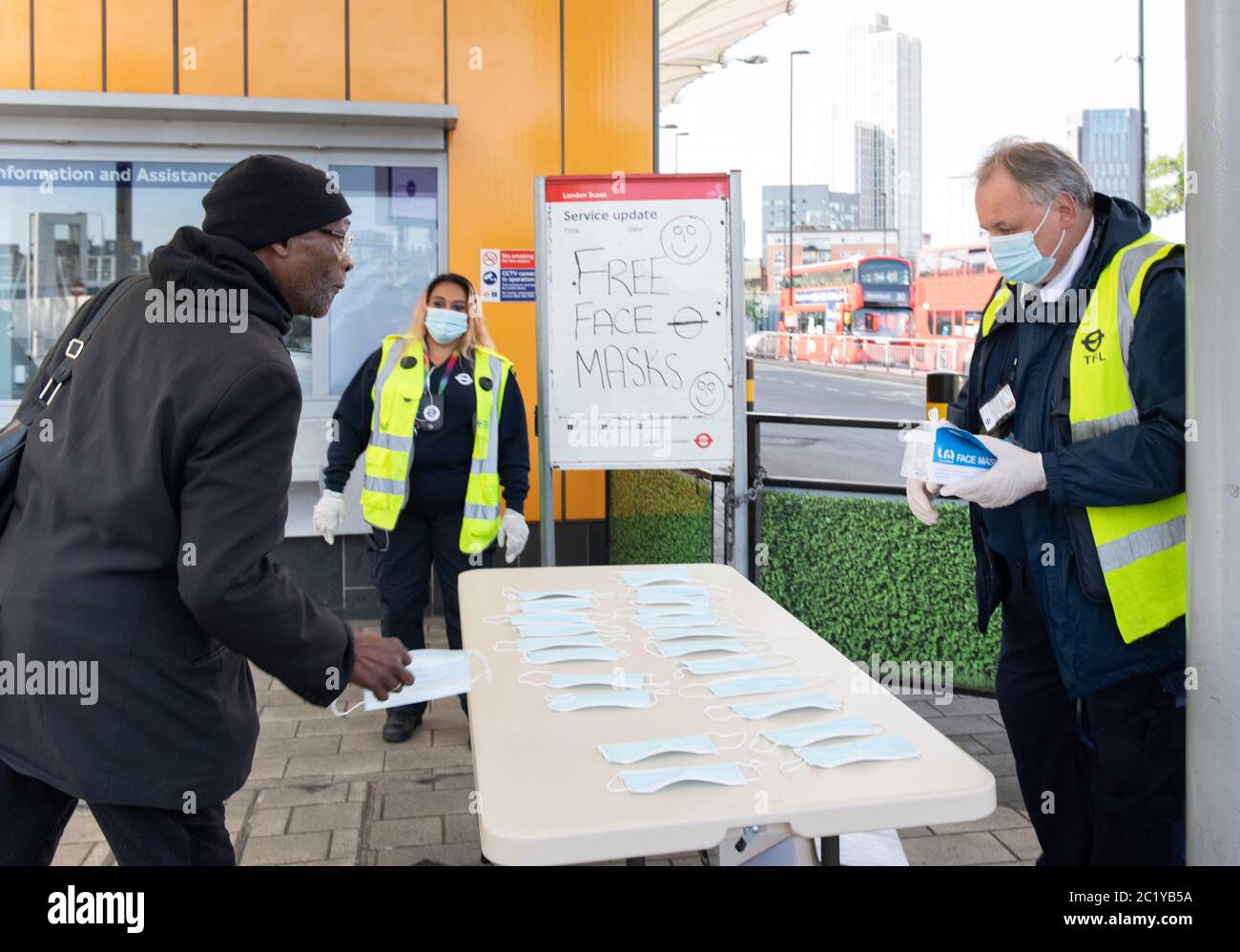TfL staff giving out face masks at Stratford bus station after the ...