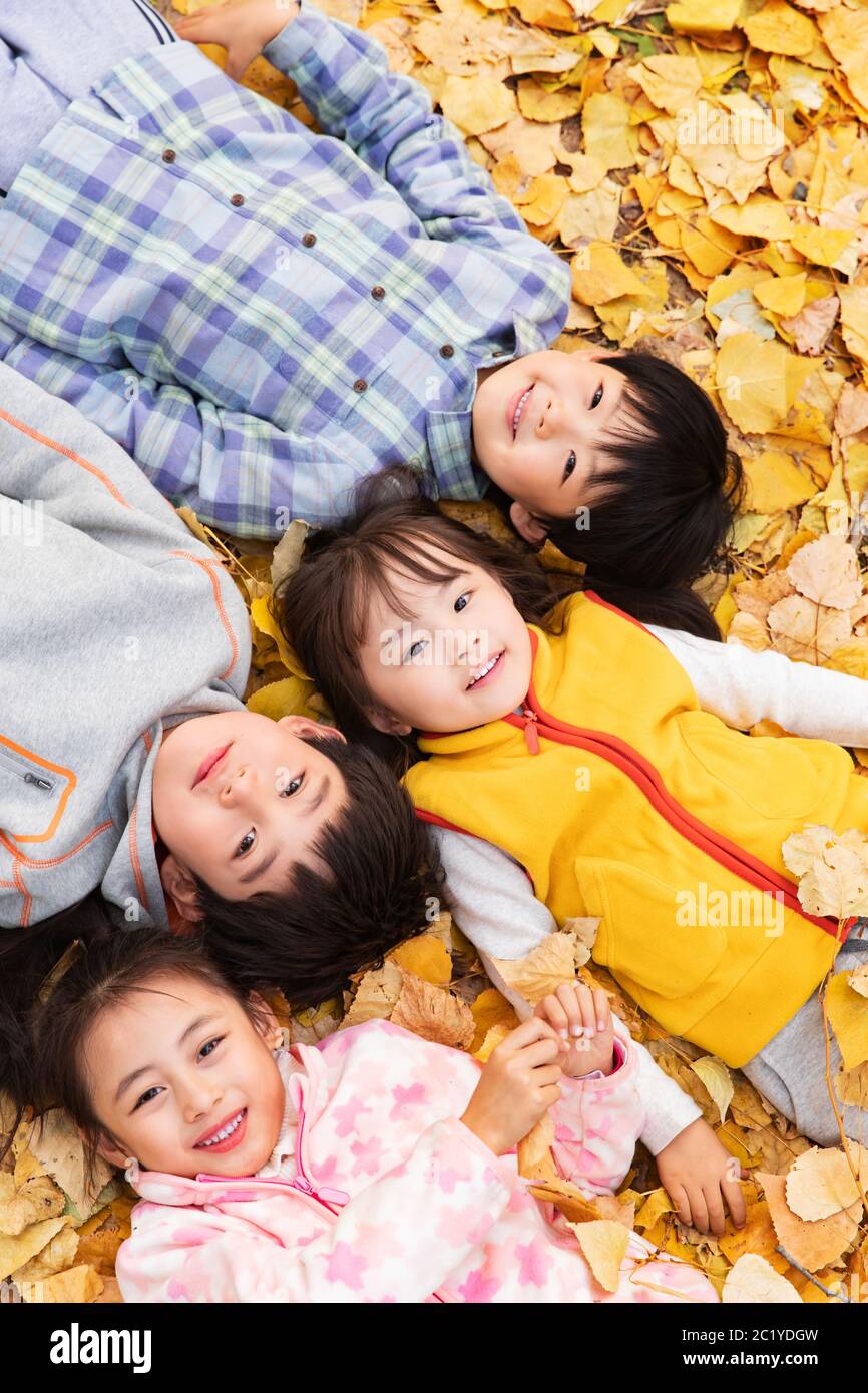 Child lay down grass hi-res stock photography and images - Alamy
