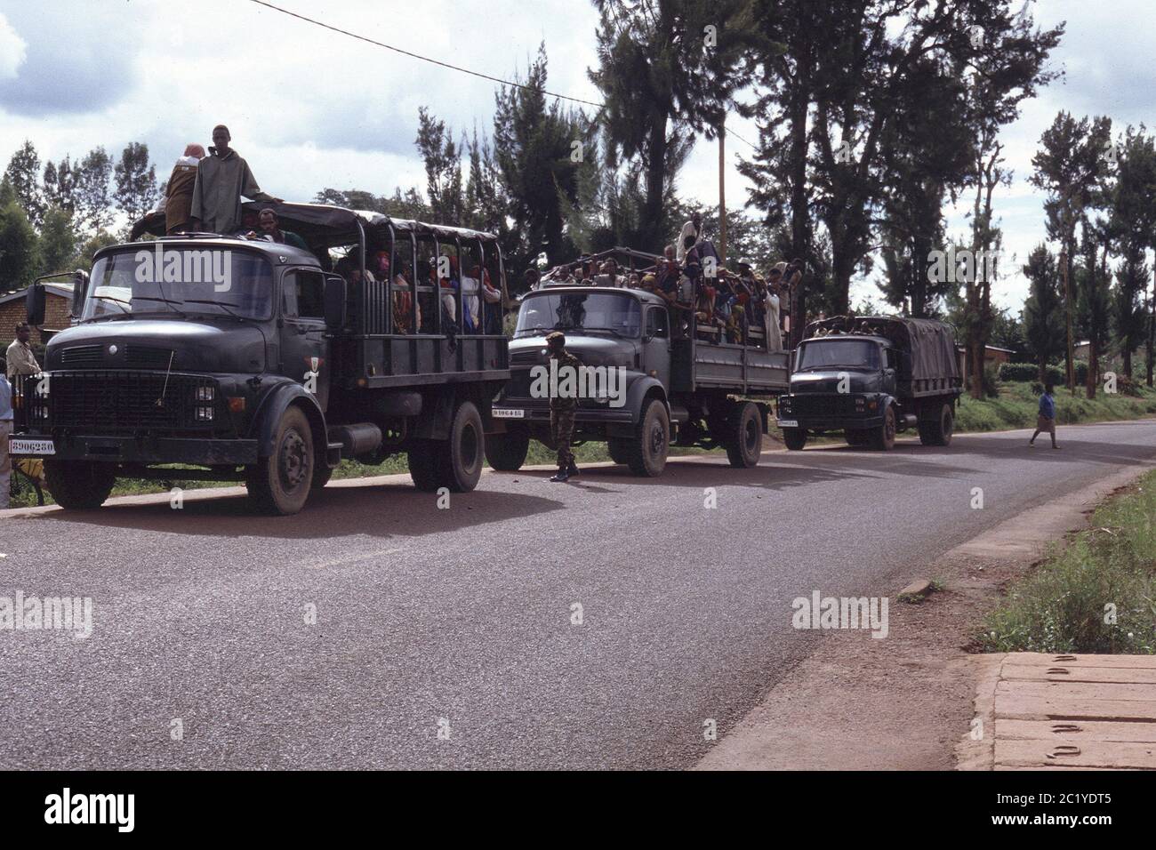 Tutsi refugees arrive in Burundi by trucks from Rwandan border 1994 ...