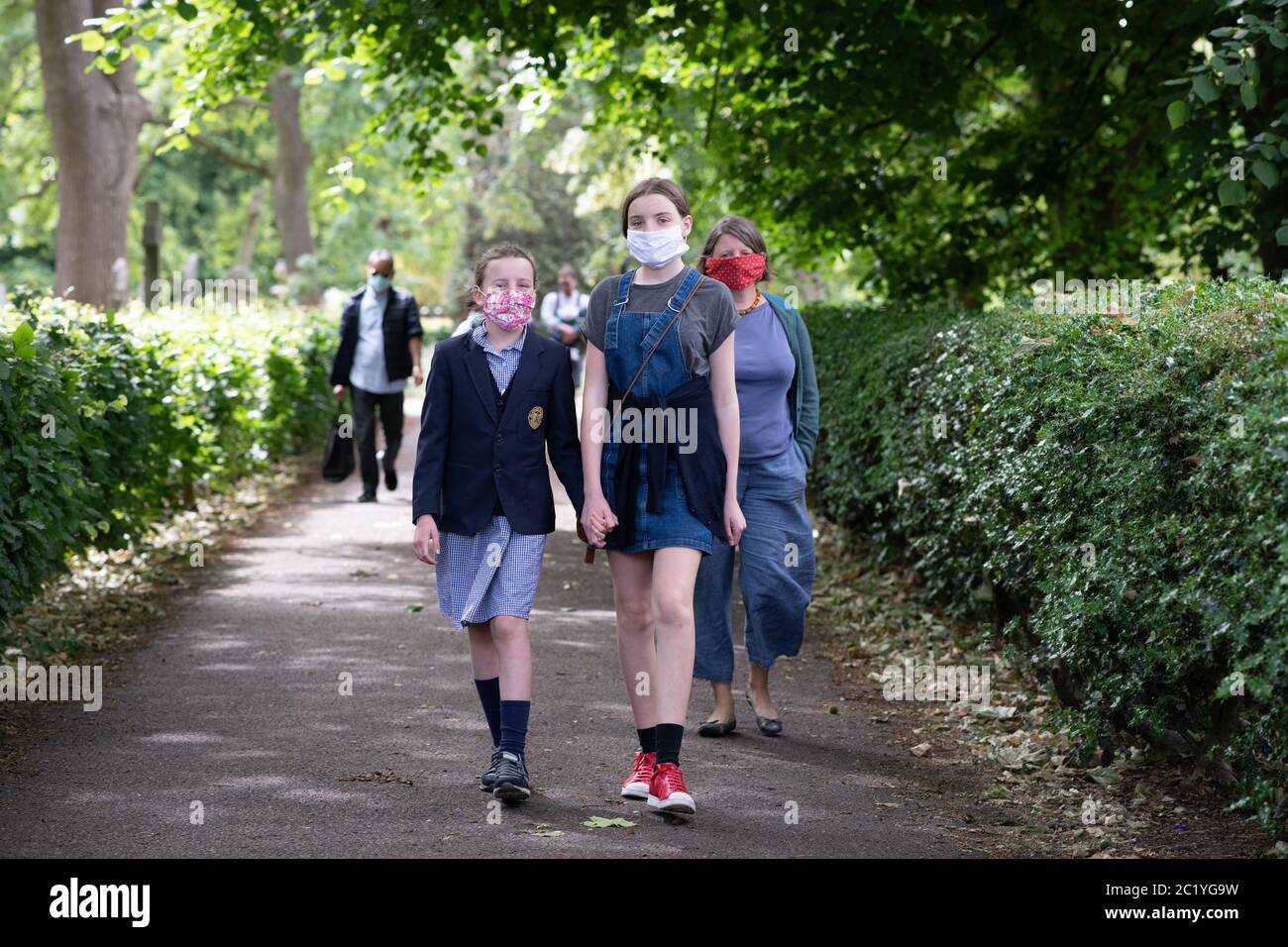 Children wearing facemasks during coronavirus pandemic. Barons Court ...