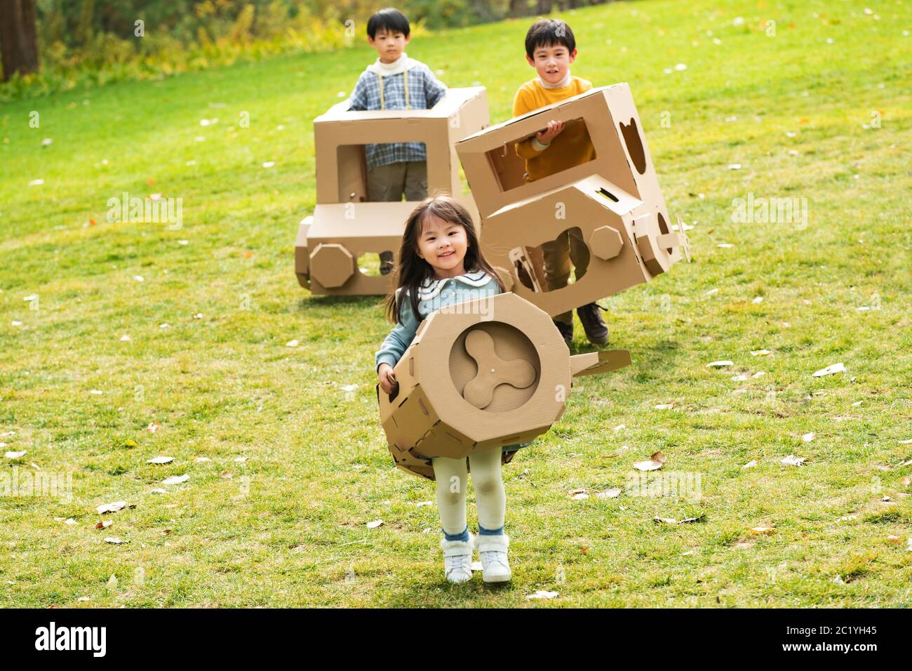 Happy children's play to fly Stock Photo - Alamy