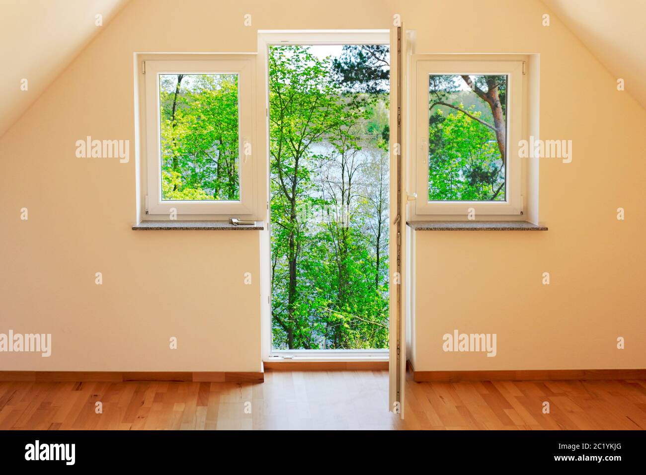 Window with green view Stock Photo - Alamy