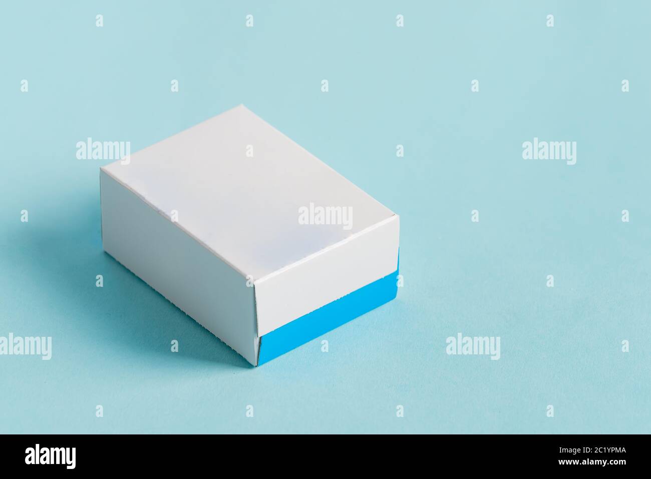 Handmade mock up paper box for package products and goods on a light ...