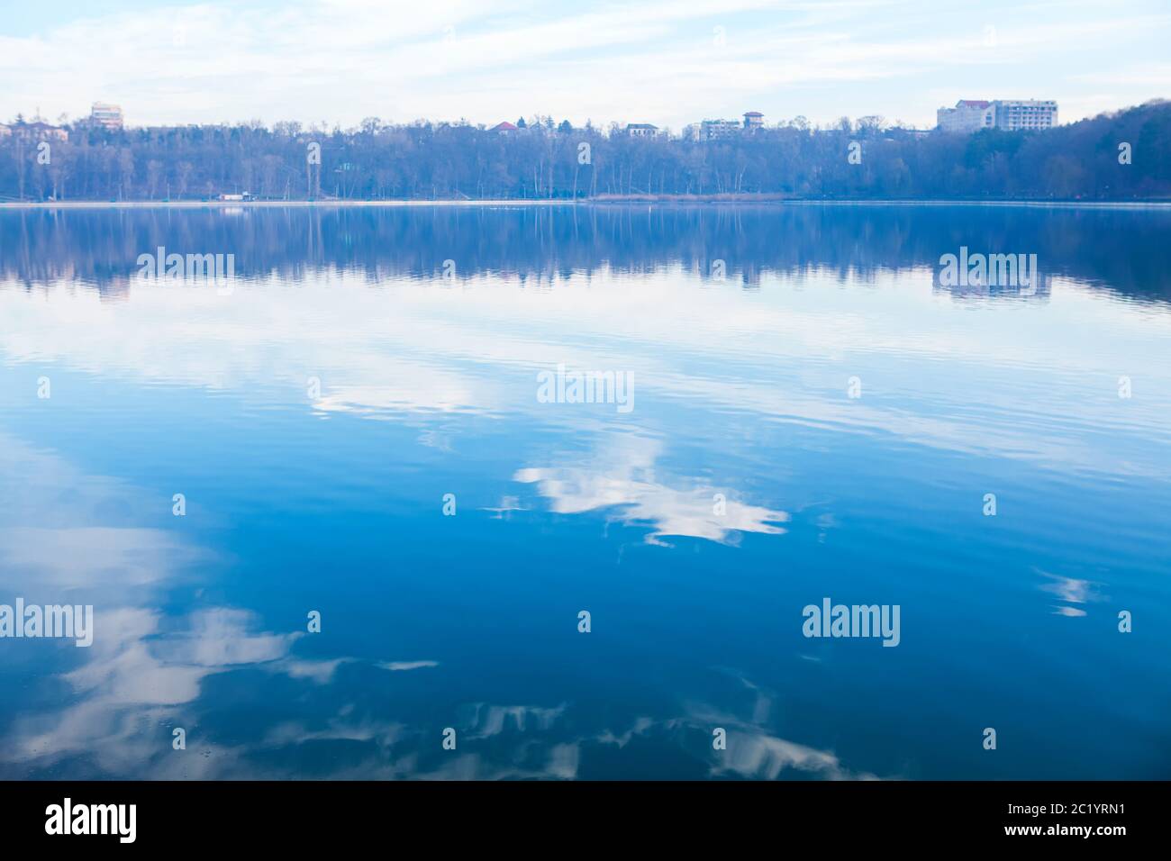 morning with clouds reflection in the lake water Stock Photo - Alamy