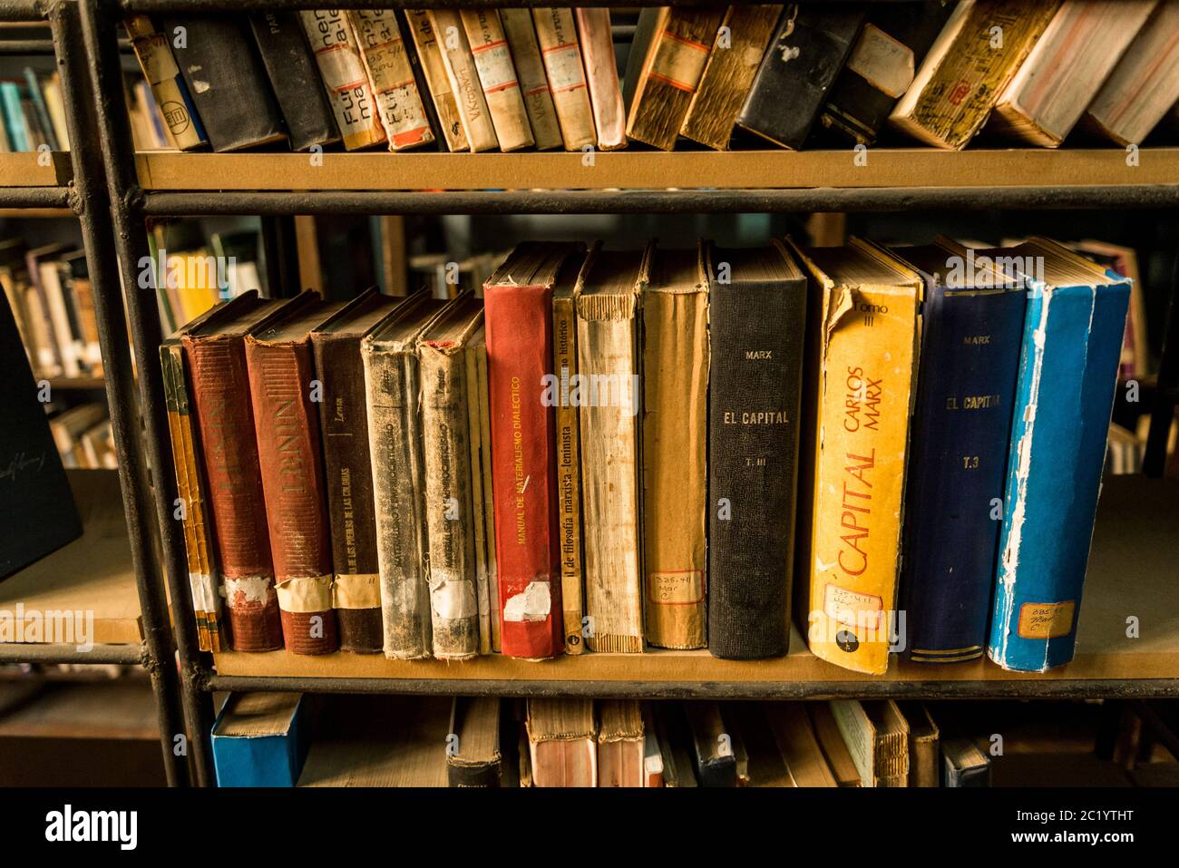 Bookshelf with old, worn books, Marti Library which is housed in the ...