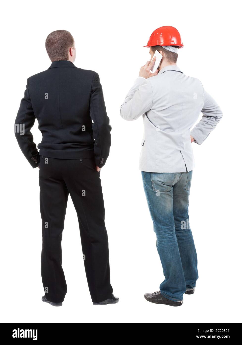 Back view of two business man in suit with mobile phone. Business team ...