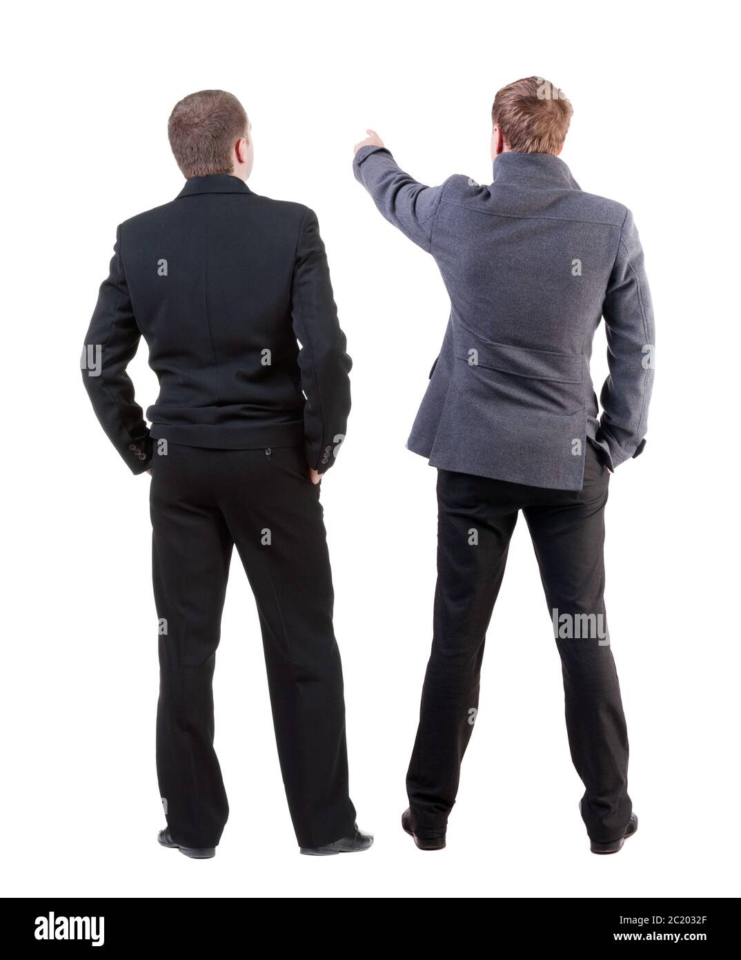Back view of two business men in suit pointing. Rear view people ...