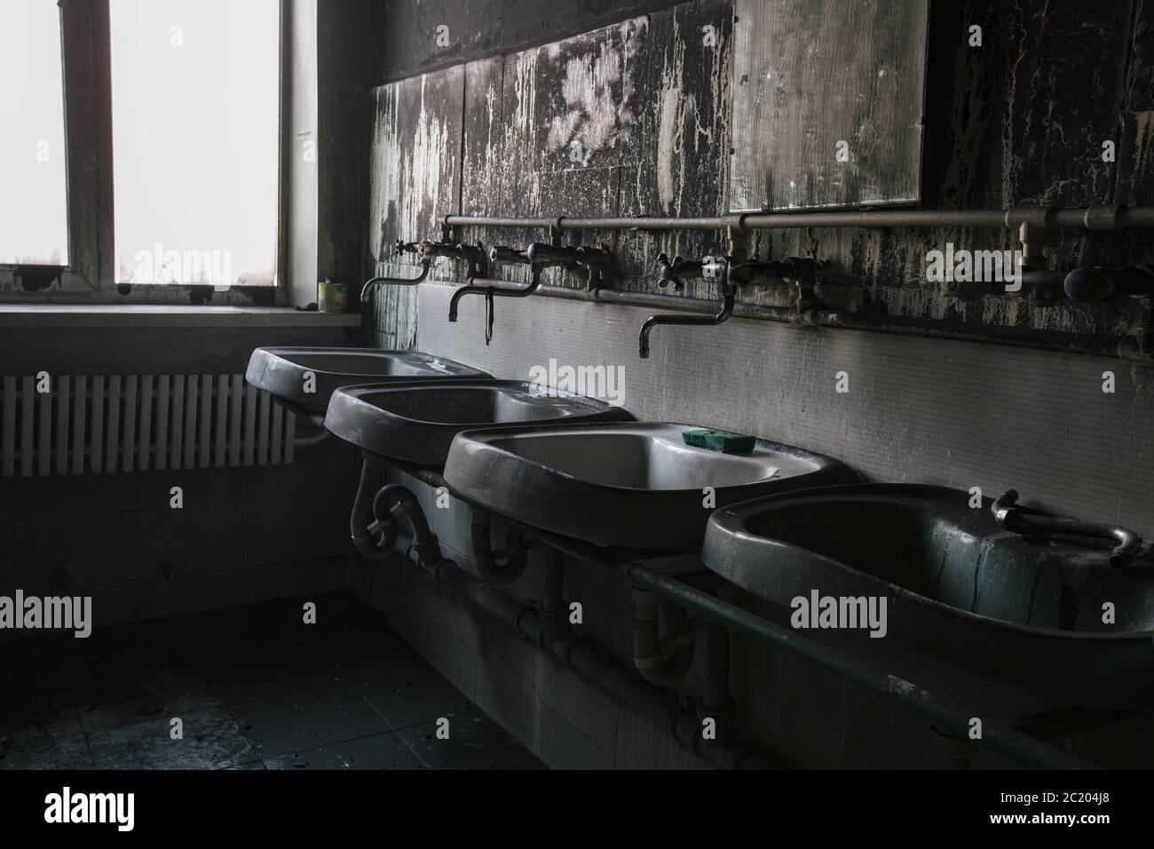 Burnt house interior. Charred walls of toilet after a fire Stock Photo ...