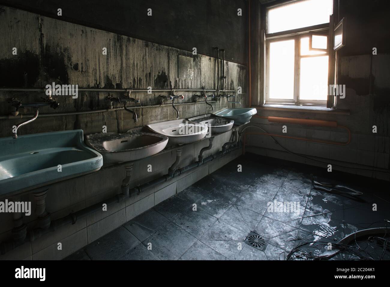 Burnt house interior. Charred walls of toilet after a fire Stock Photo ...