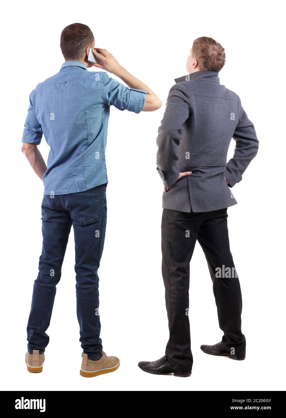Back view of two business man in suit with mobile phone. Business team ...