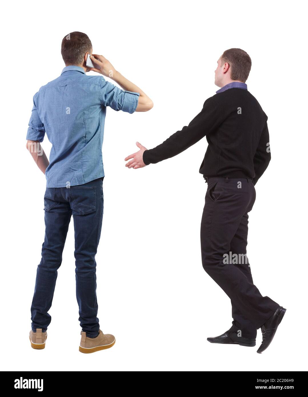 Back view of two business man in suit with mobile phone. Business team ...