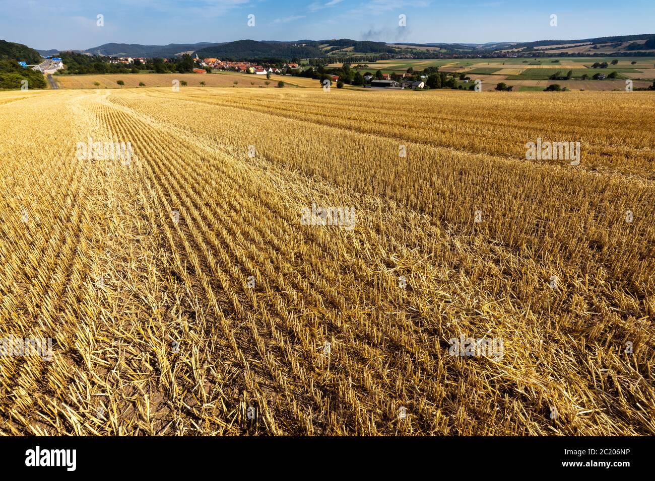 Grain fields after the harvest at Herleshausen in Germany Stock Photo ...