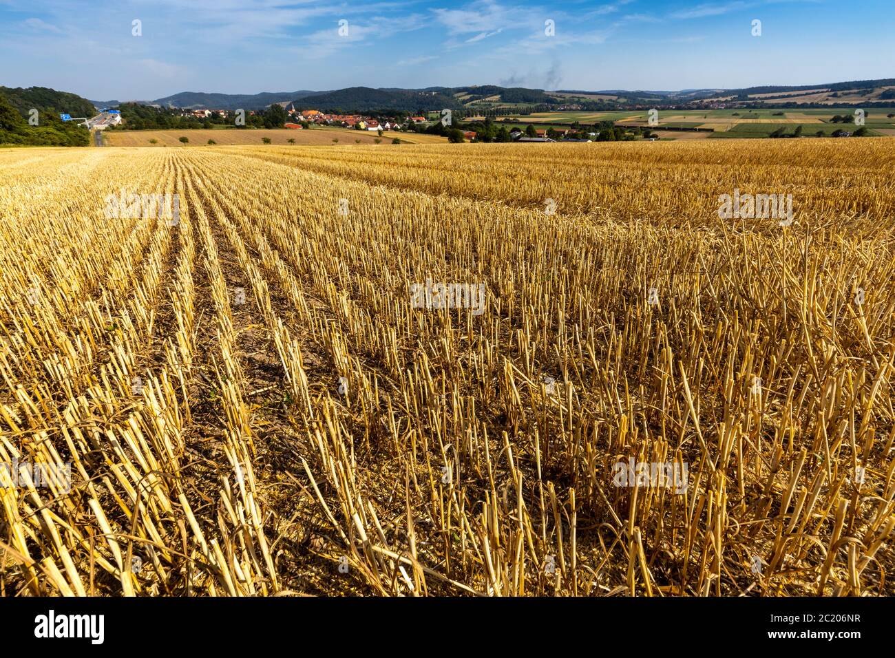 Grain fields after the harvest at Herleshausen in Germany Stock Photo ...