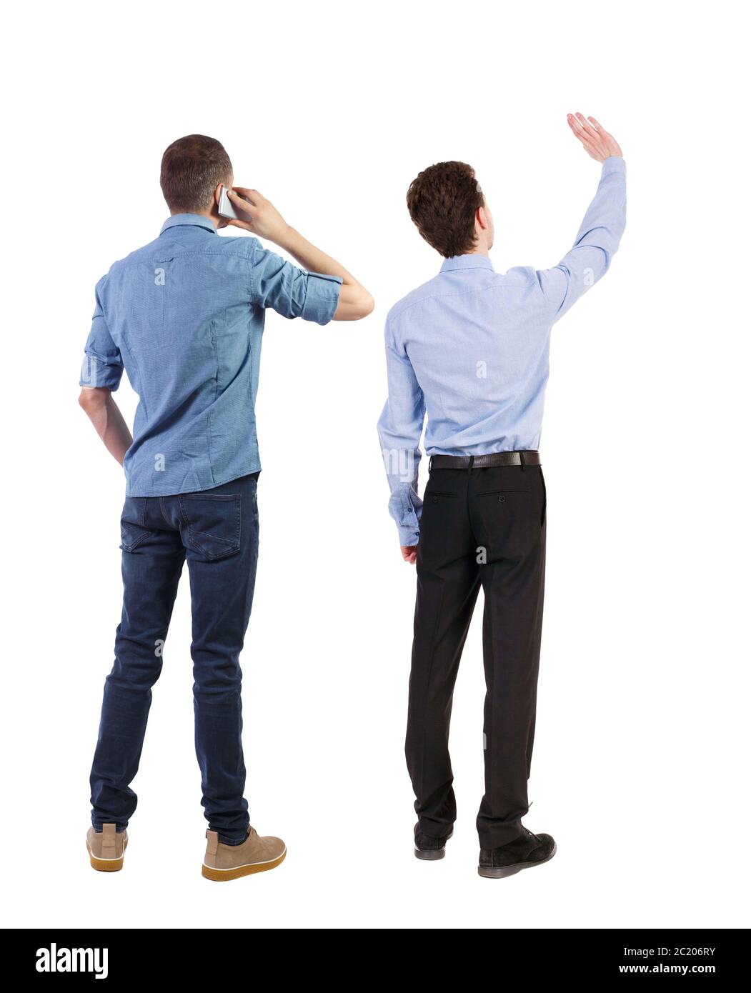 Back view of two business man in suit with mobile phone. Business team ...