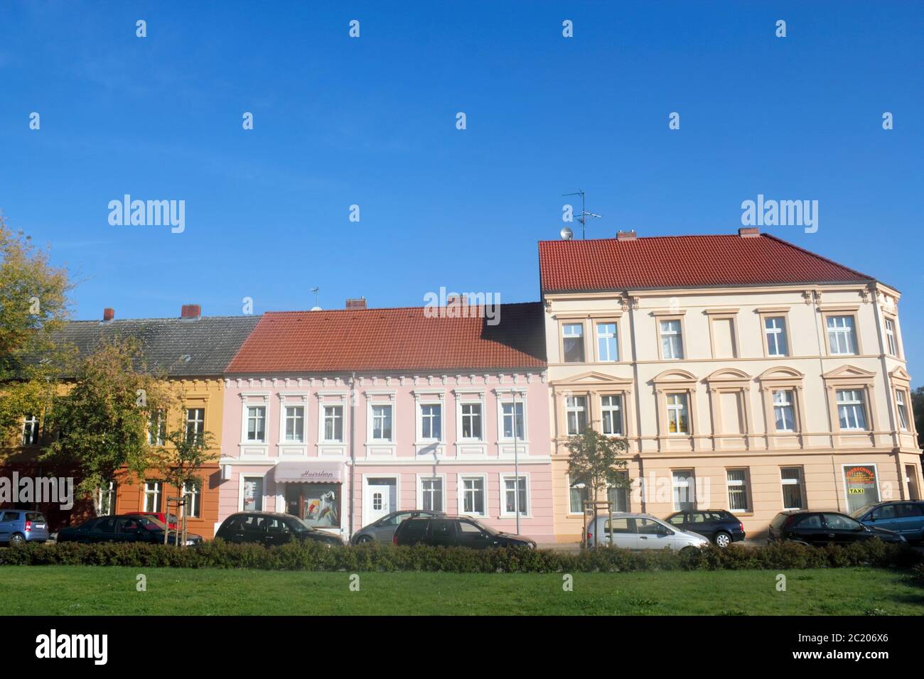 Renovated row of houses Stock Photo - Alamy