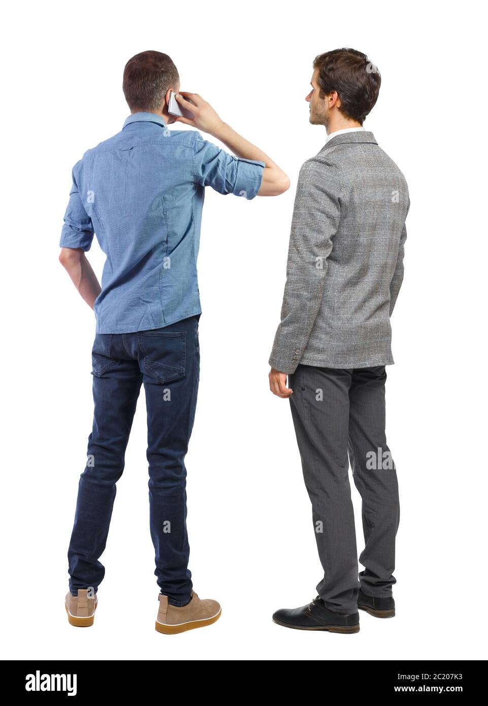 Back view of two business man in suit with mobile phone. Business team ...