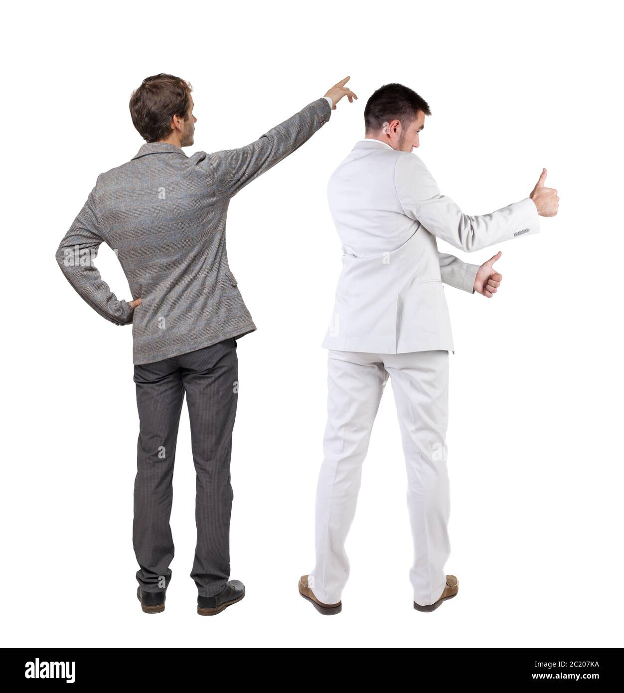 Back view of two business men in suit pointing. Rear view people ...