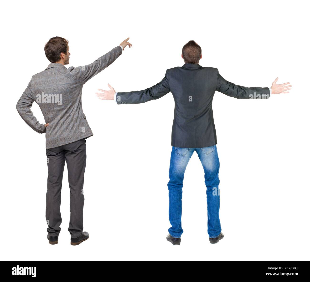 Back view of two business men in suit pointing. Rear view people ...