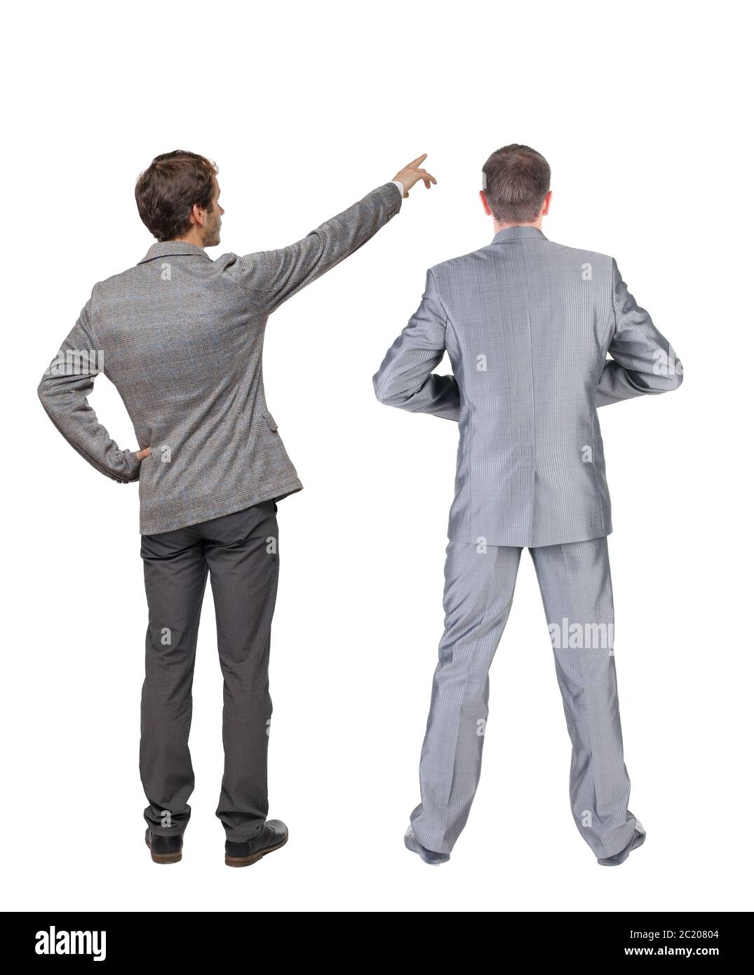 Back view of two business men in suit pointing. Rear view people ...