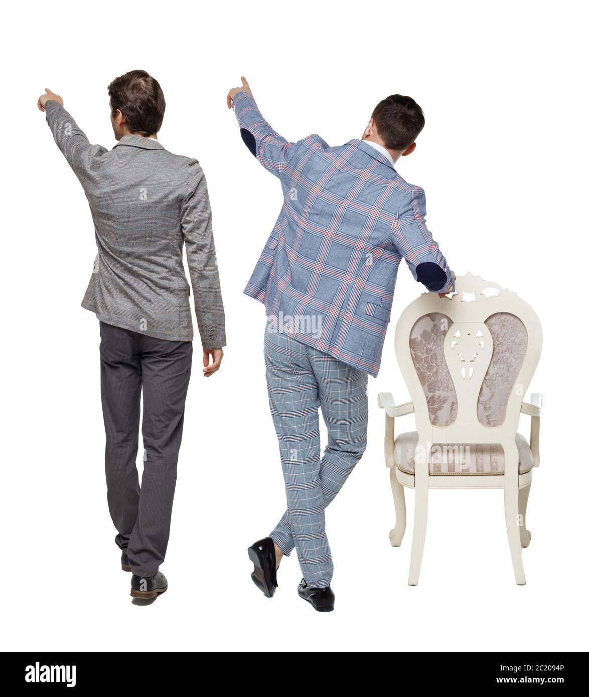 Back view of two business men in suit pointing. Rear view people ...