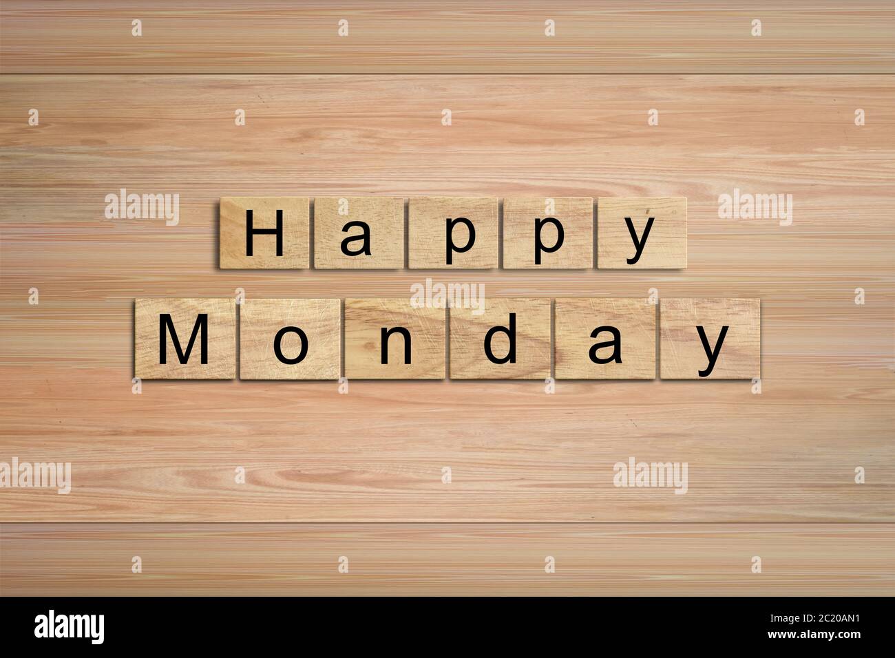 Happy Monday word written on wood block. Message text on wooden table ...