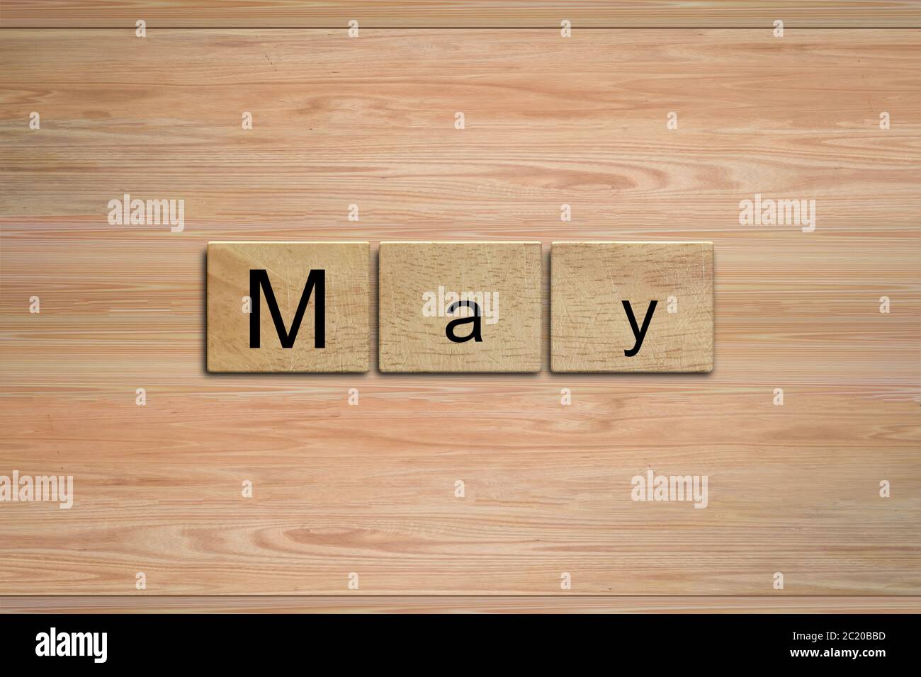May word written on wood block. Message text on wooden table for ...