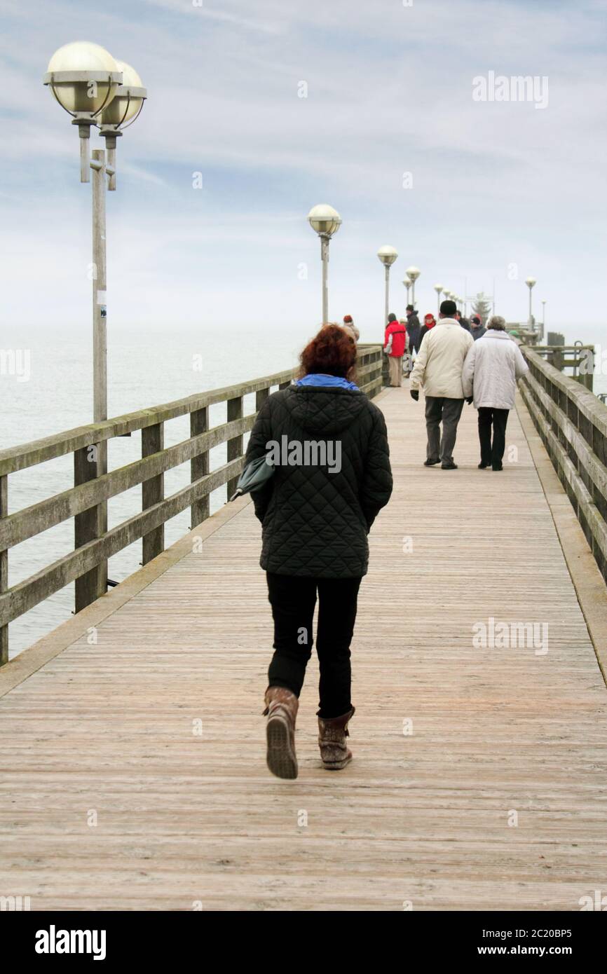 Walking on a pier Stock Photo - Alamy