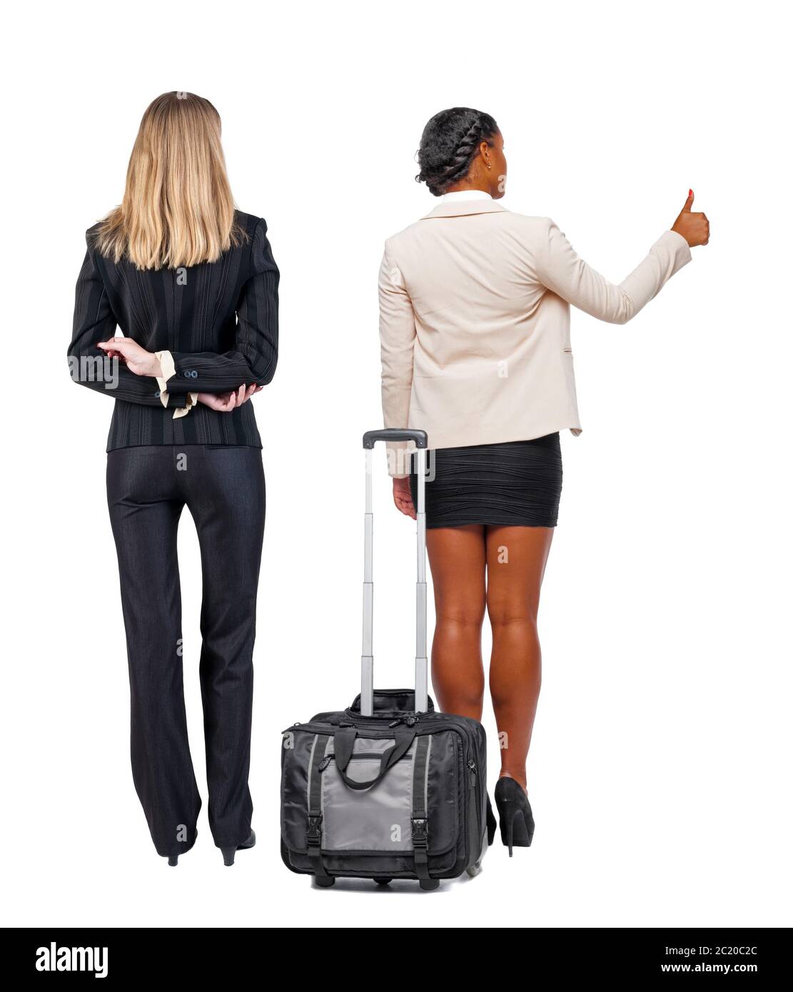 Women in suit pointing hi-res stock photography and images - Alamy