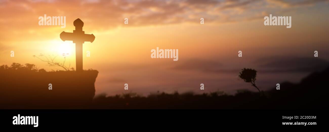 Silhouette of christian cross at sunset background. Idea for worship or ...