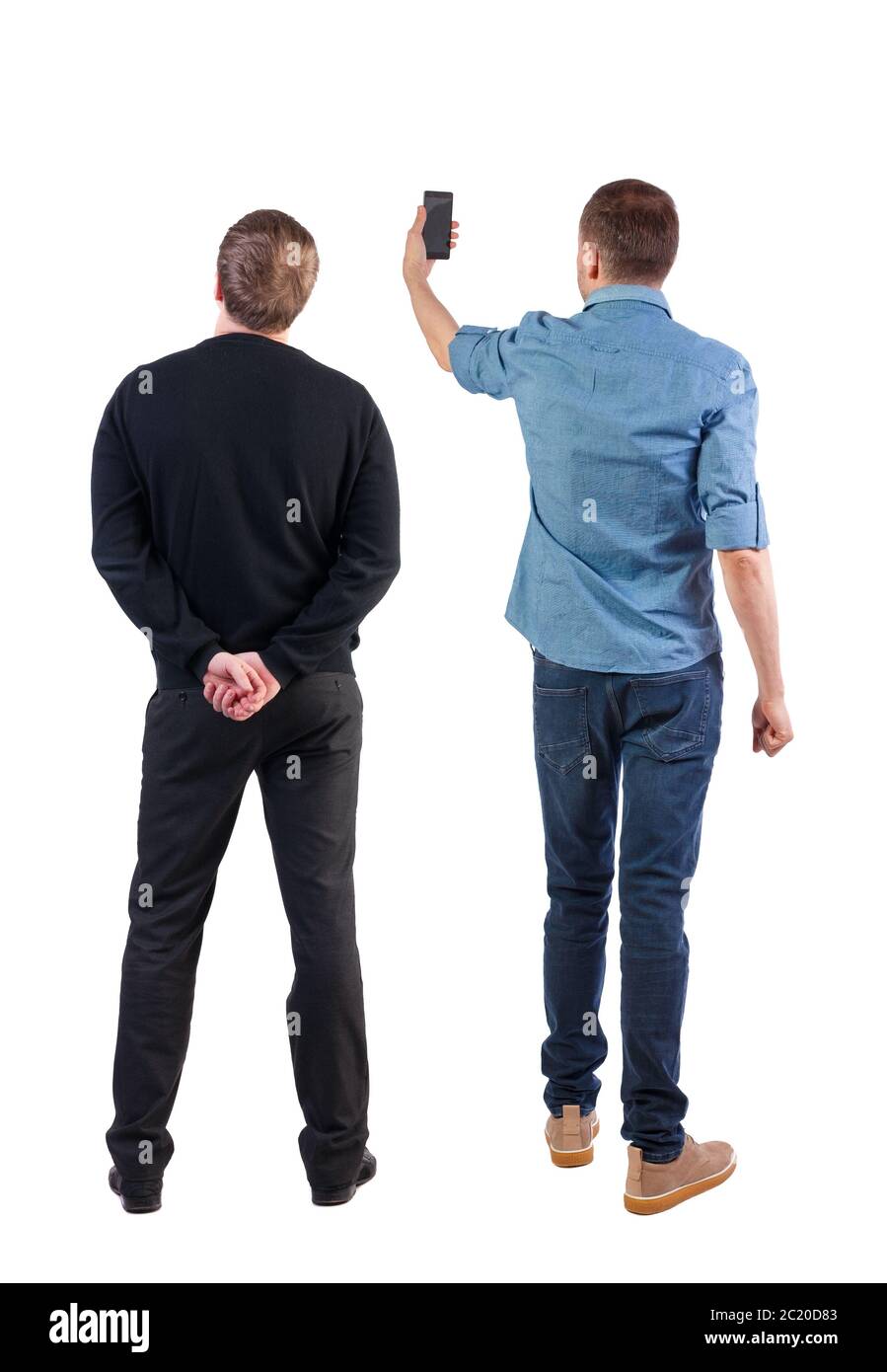 Back view of two business man in suit with mobile phone. Business team ...