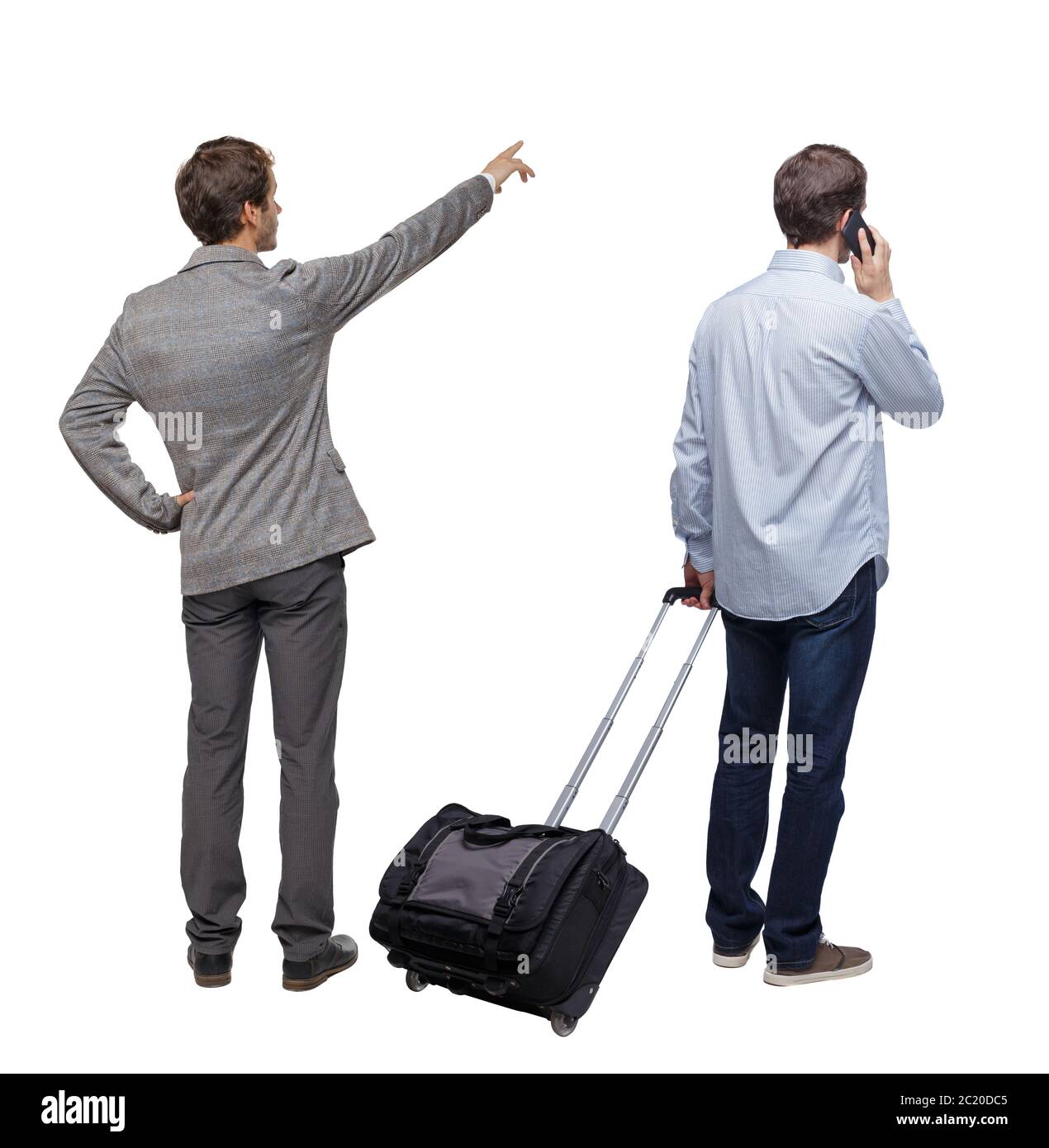 Back view of two business men in suit pointing. Business team ...