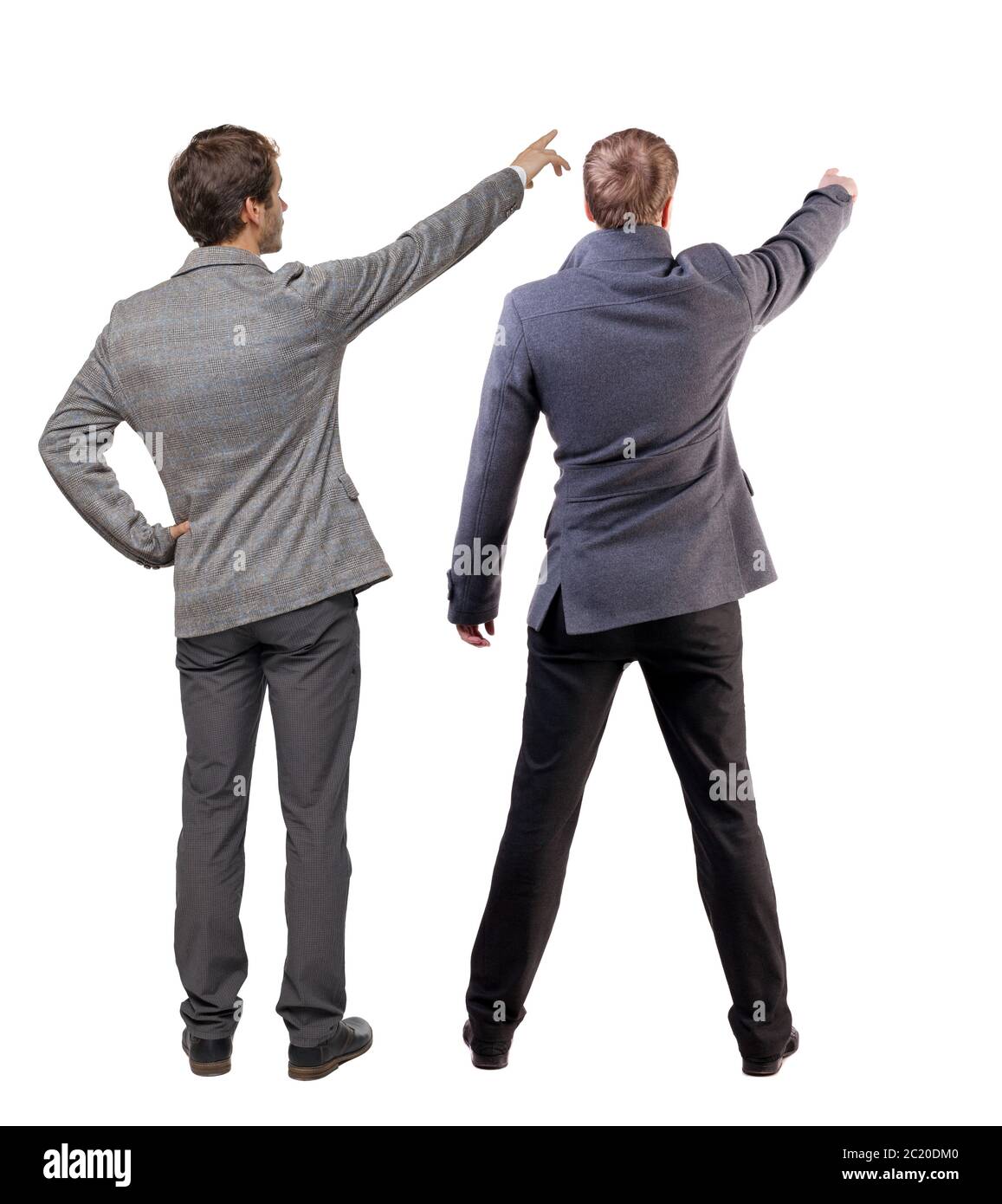 Back view of business man and business woman in suit pointing. Business ...